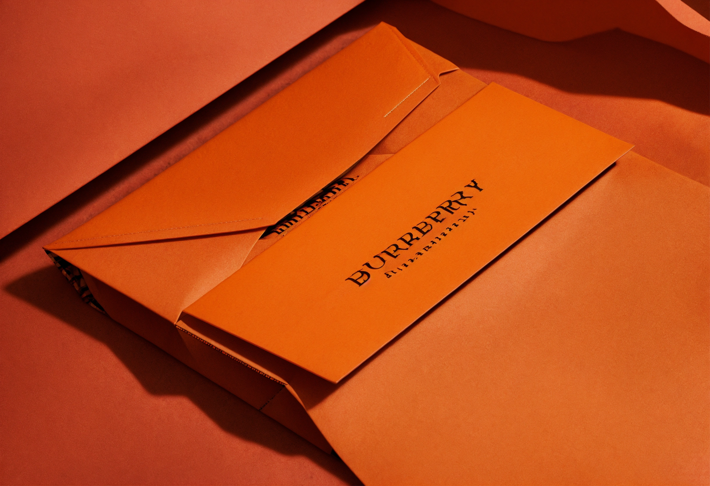 Lexica - A Burberry letter in an orange envelope with the brand's logo ...